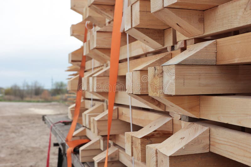 The Boards are Stacked for Transportation. the Lumber is Loaded into a ...