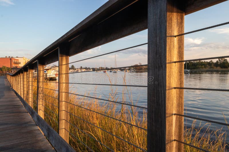 Boardwalk Along a River at Sunset Stock Image - Image of georgetown ...