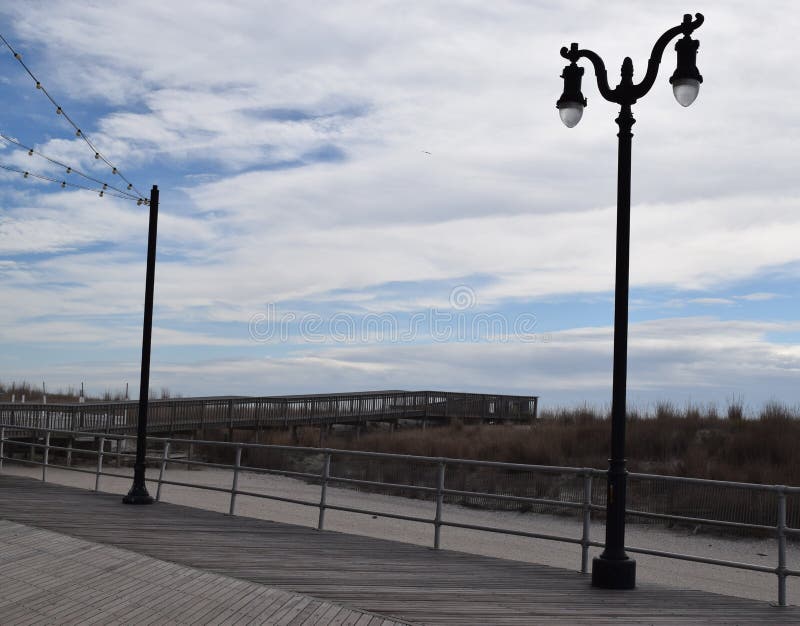 Boardwalk scene stock photo. Image of fancy, grass, ocean - 69625054