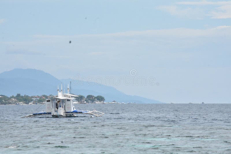 A Boat Afloat in Ocean Water Editorial Stock Photo - Image of floats ...