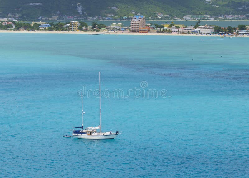 Boat Alone in Caribbean Ocean Stock Photo - Image of calm, sailing ...