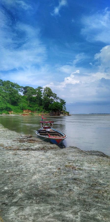 Boat alone.. stock image. Image of shore, vehicle, river - 263348493