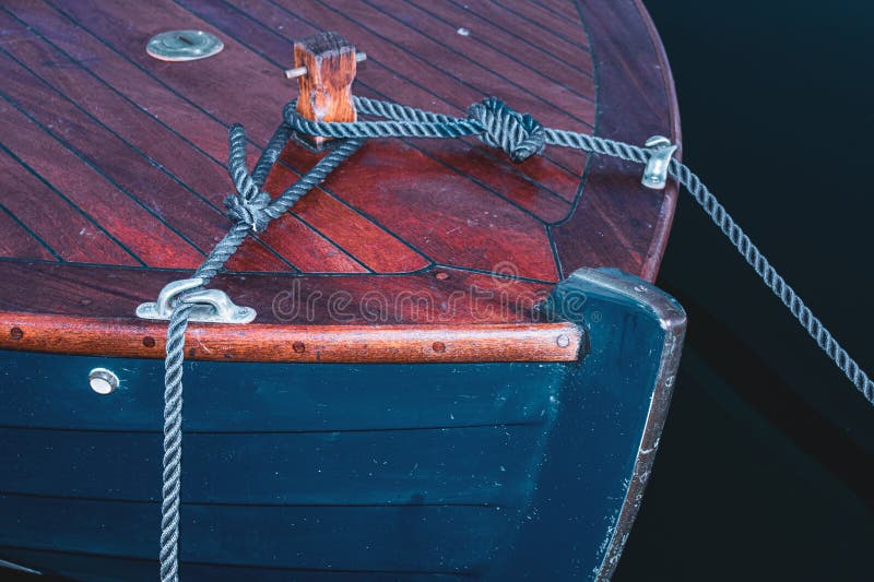 Boat Anchored in Water with Ropes and a Secure Knot Stock Image - Image ...