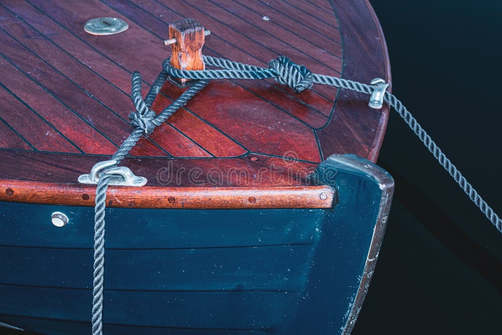 Boat Anchored in Water with Ropes and a Secure Knot Stock Image - Image ...