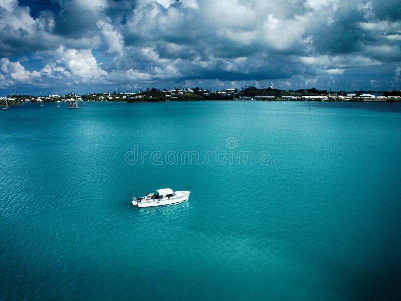 Boat in azure bay stock photo. Image of ocean, seascape - 115212954