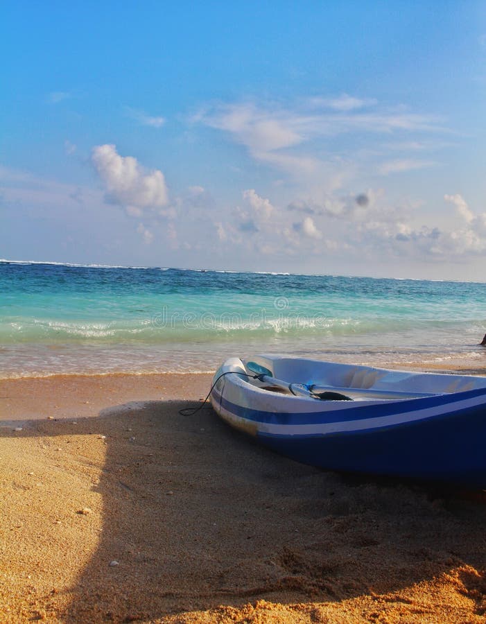 Boat in Beach Sky Blue Ocean Stock Photo - Image of blue, boat: 304445636