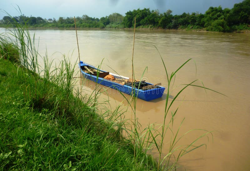 Boat on Bengawan Solo River Stock Photo - Image of travelling ...