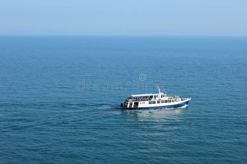 Boat in the blue sea stock image. Image of transport - 66215909