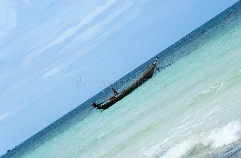 Boat on blue water stock image. Image of beached, ocean - 5486791