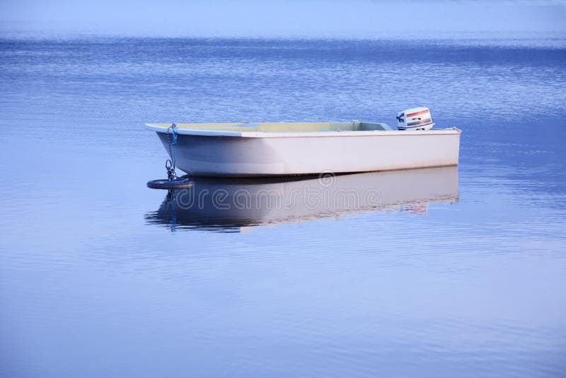 Boat in Blue Water stock photo. Image of idyllic, calm - 34540354