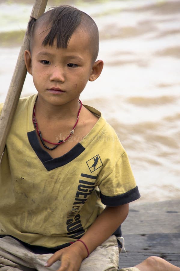 Boat Boy editorial stock image. Image of poor, raft, boat - 25286534