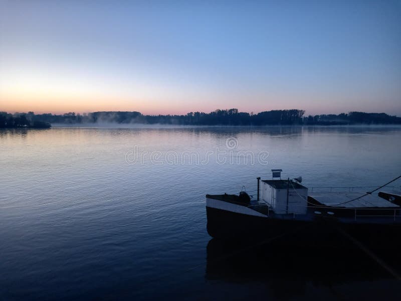 Boat on the Calm Danube River in the Evening Stock Photo - Image of ...
