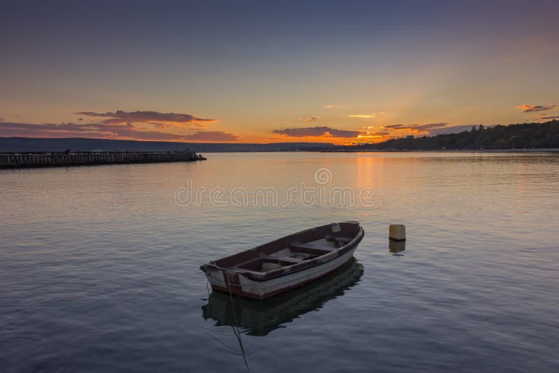 Boat in Calm Water at Sunset Stock Image - Image of coast, beautiful ...