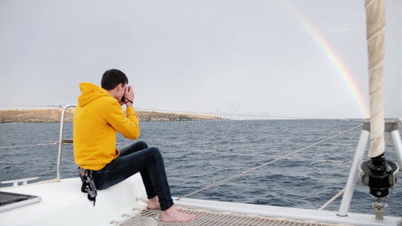 Boat Captain Active Confidently Steering Sail on His Yacht while the ...