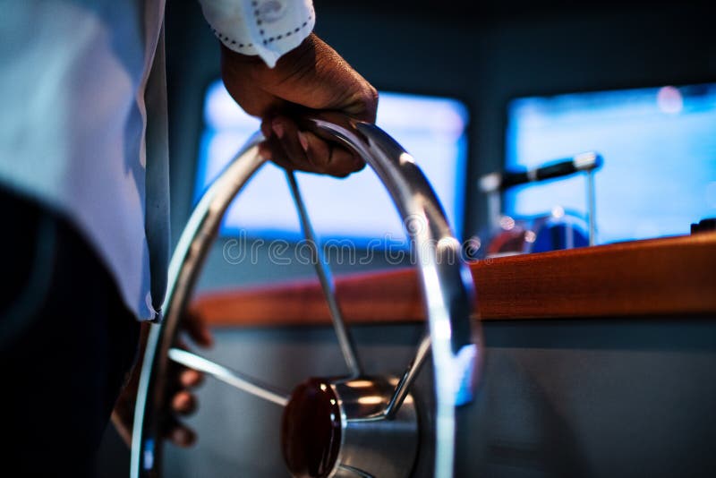 Boat Captain Hands Navigating and Moving Instruments in the Cockpit ...