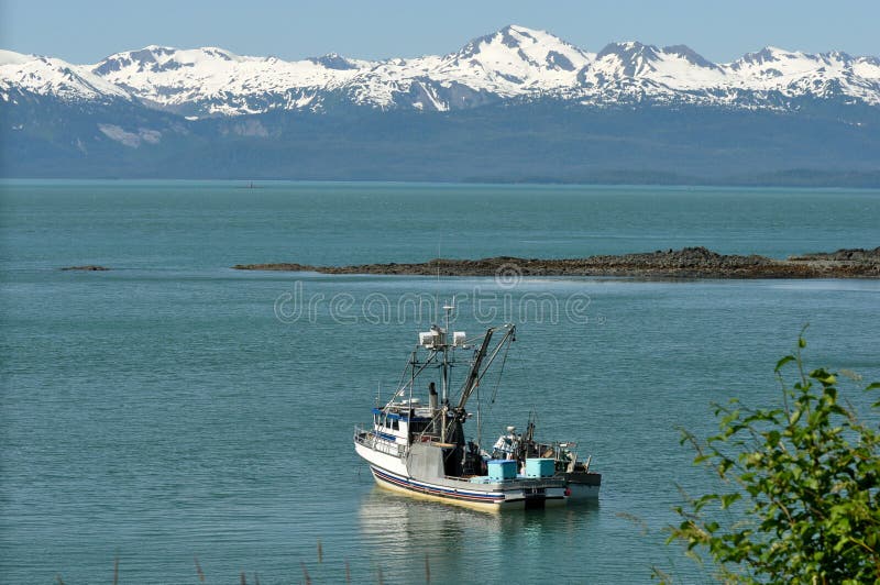 Boat in cove stock photo. Image of rock, snow, water - 10485332