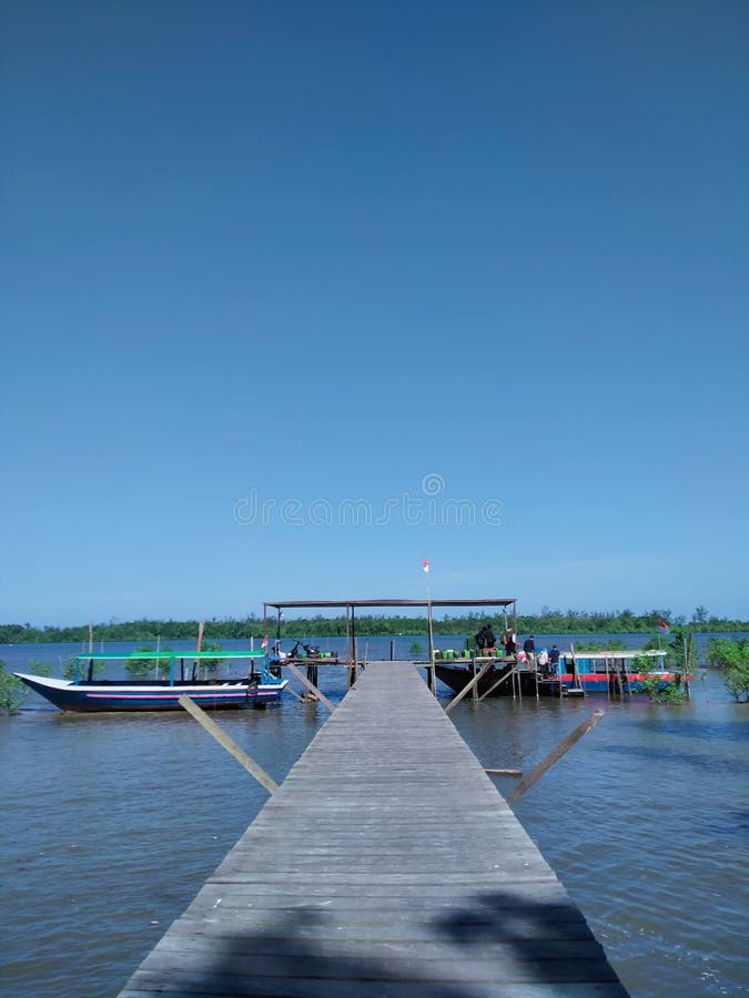 Boat Crossing To Panrita Beach in Muara Badak Stock Image - Image of ...