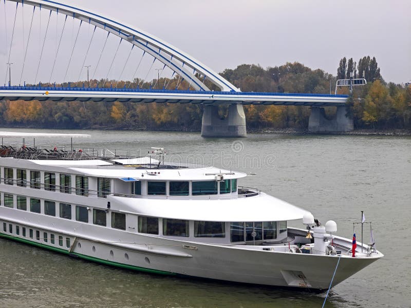 Boat on Danube River in Bratislava with Apollo Bridge Behind Stock ...