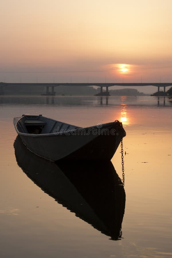 Boat at dawn stock photo. Image of darkness, chain, water - 37019434