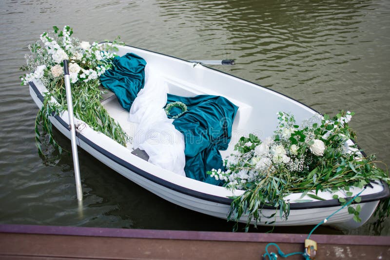 Boat Decorated with Flowers. Boat with Flowers on Lake Stock Photo ...
