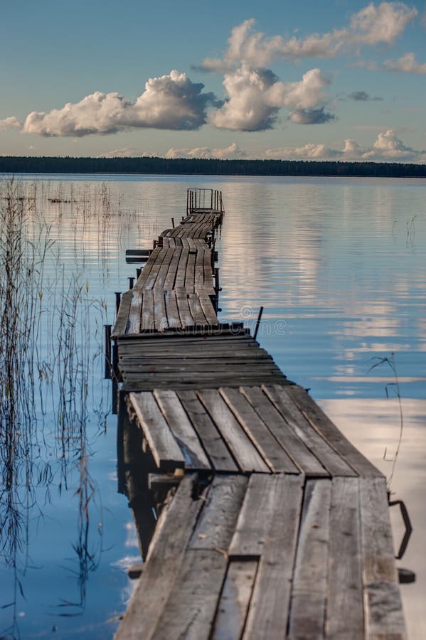 Boat dock on a lake stock photo. Image of boat, fish - 27339166