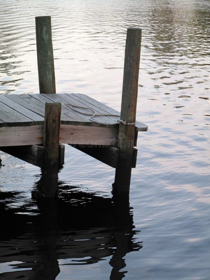 Boat Dock Reflection stock image. Image of anchored, landing - 56156763