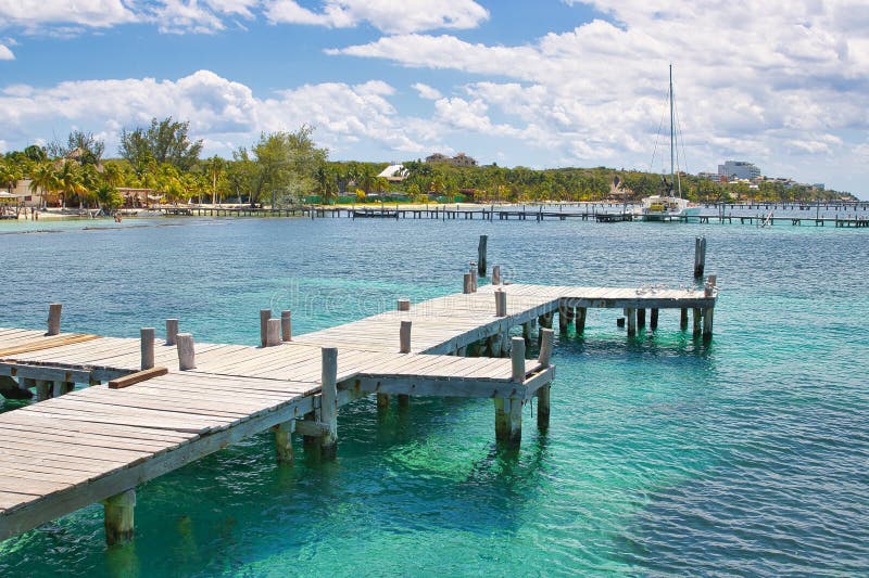 A Boat Dock Sitting in a Beautiful Blue Ocean Stock Image - Image of ...