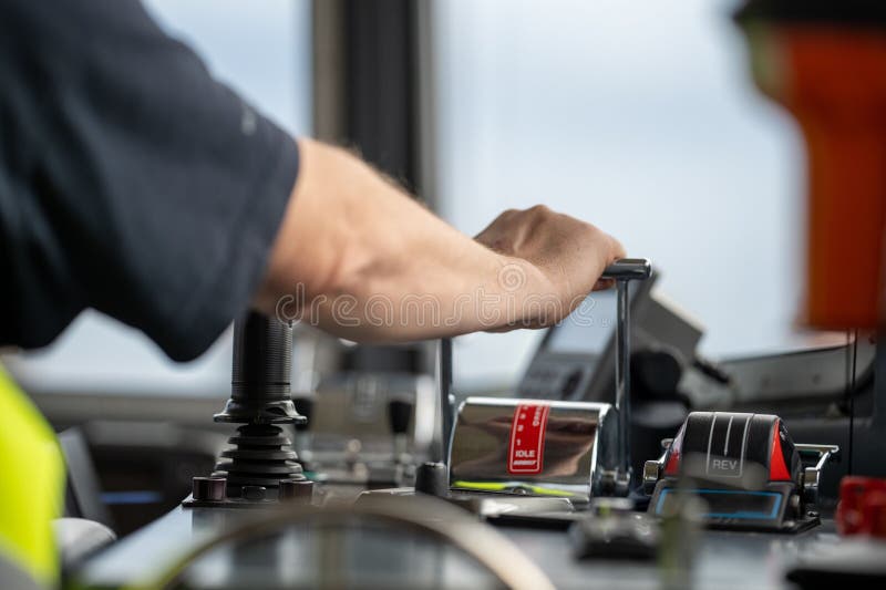 Boat Driver Holding the Remote Control Device of a Boat with Blurred ...