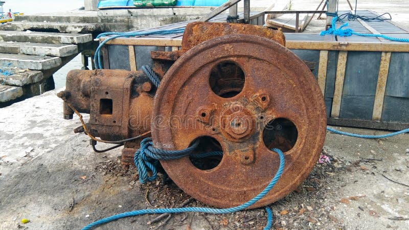 The Boat Engine Was Broken and Lying on the Edge of the Beach. Stock ...