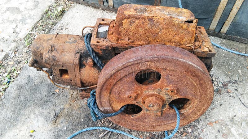 The Boat Engine Was Broken and Lying on the Edge of the Beach. Stock ...