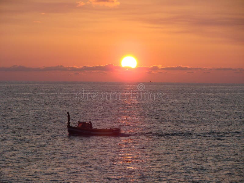 Sunset on Bleak See stock image. Image of water, boat - 117209603