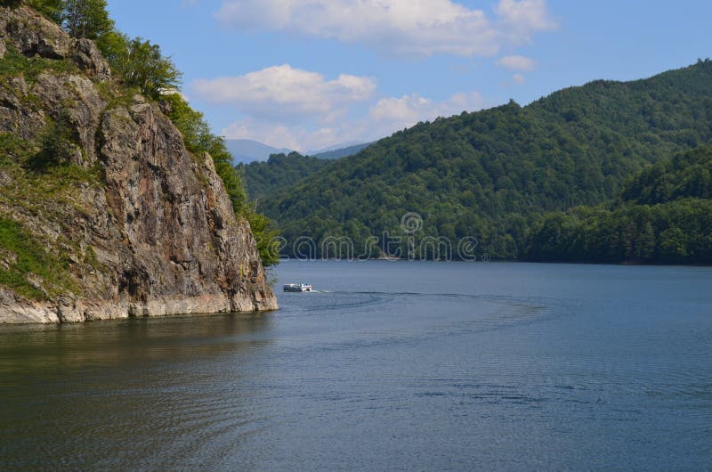 Boat floating on the lake editorial stock photo. Image of lake - 33359973