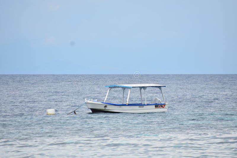 A Boat Floating in Ocean Water Editorial Stock Image - Image of fluid ...