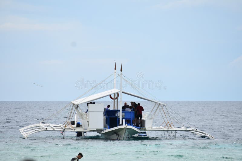 A Boat Floating in Ocean Water Editorial Image - Image of water ...