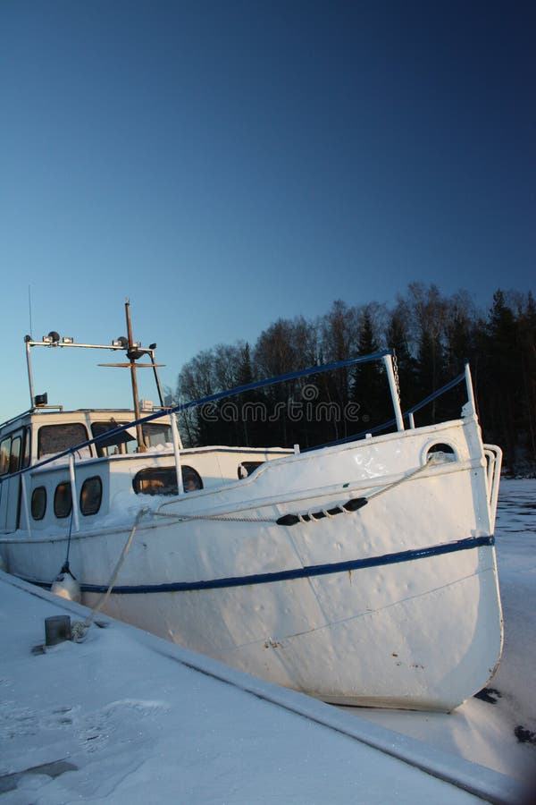 Boat in frozen lake stock photo. Image of empty, snow - 17197016