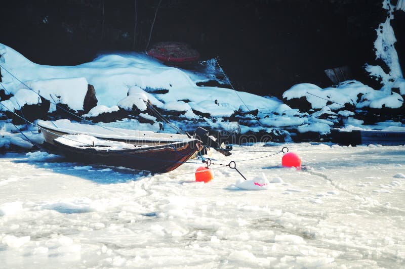 A boat on the frozen water editorial stock photo. Image of sunny - 88351668