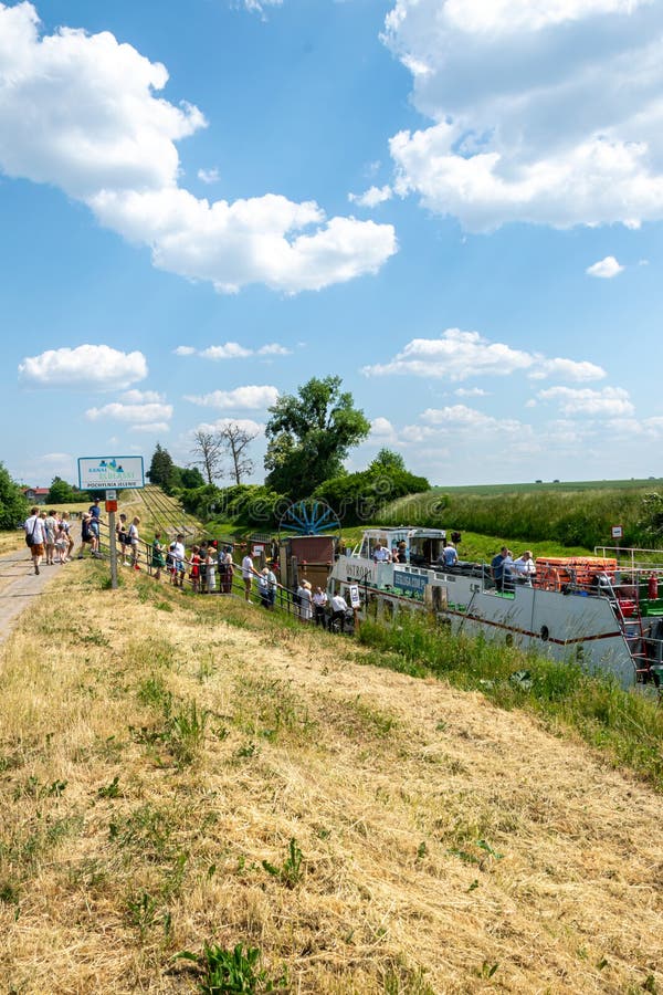 By Boat on the Grass. Queue for the Ship Editorial Photography - Image ...