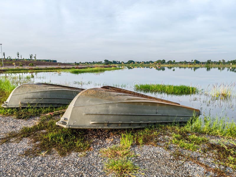 The Boat is on the Ground Near the River. Stock Image - Image of shore ...