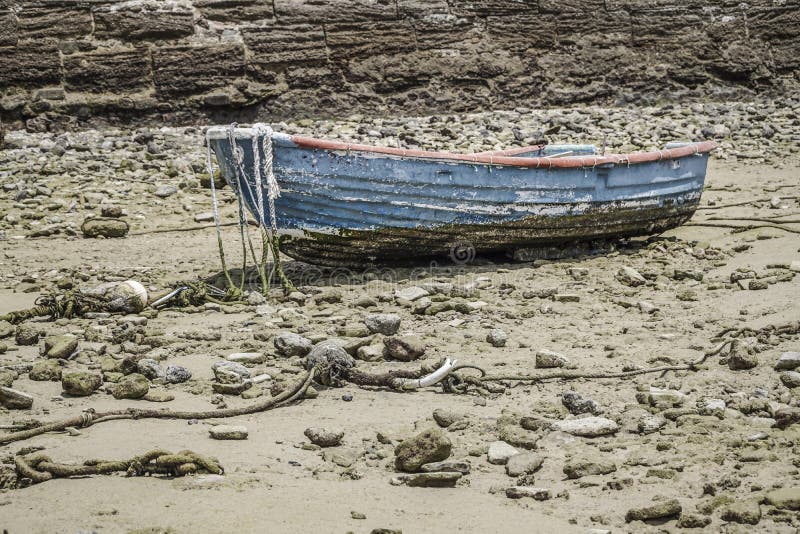 Boat on ground during tide stock image. Image of abandoned - 80896669