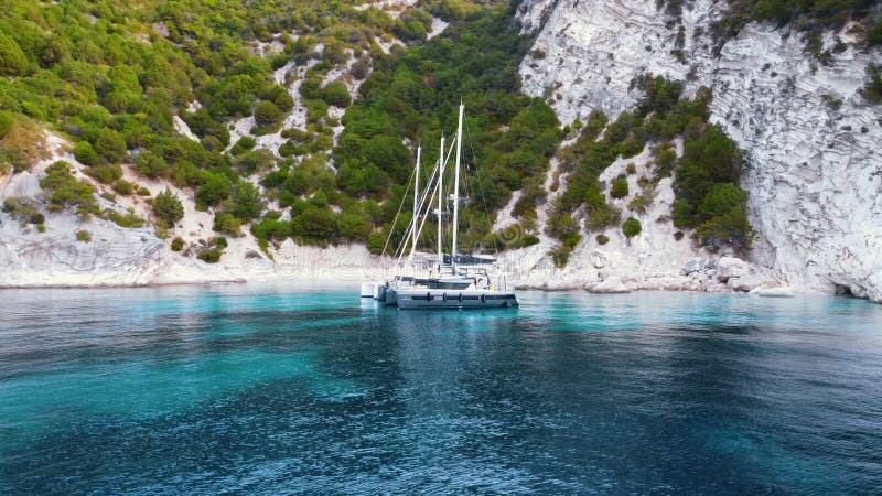 Boat Harbour with Three Boats on Crystal Water at the Bottom of Rocks ...