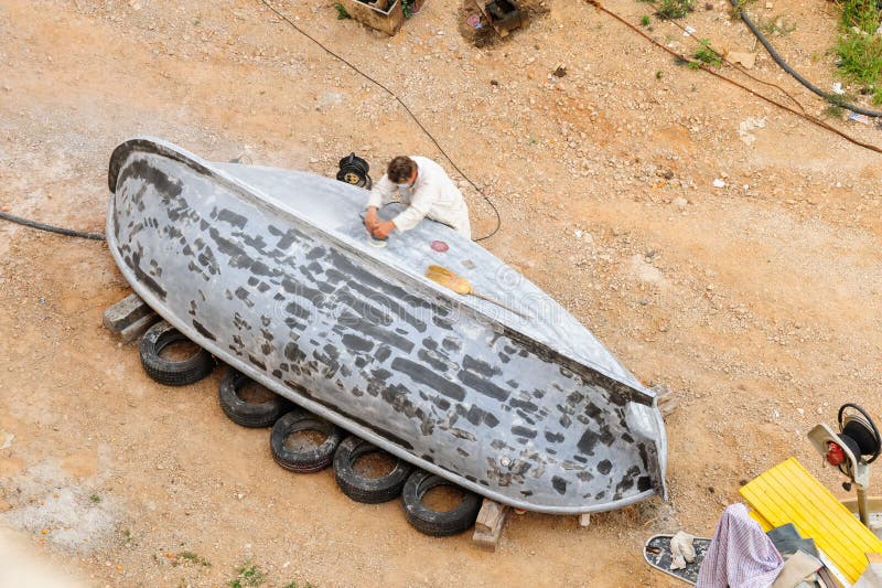 Boat hull sanding editorial image. Image of city, grouting - 70405985
