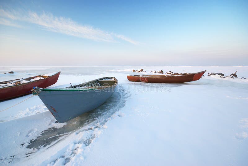 Boat on ice stock photo. Image of dusk, fishing, horizon - 170547990