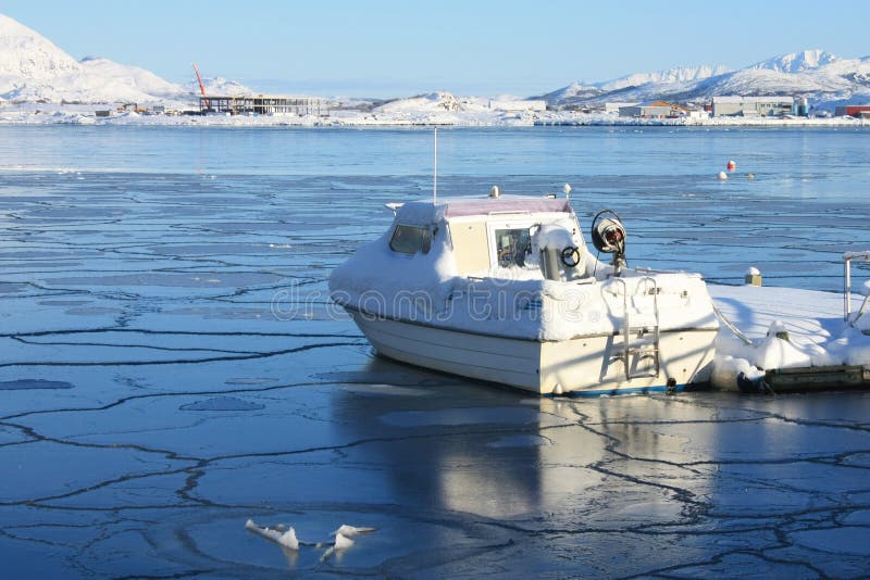 Boat on icy bay stock photo. Image of mirror, fjord, arctica - 13258380