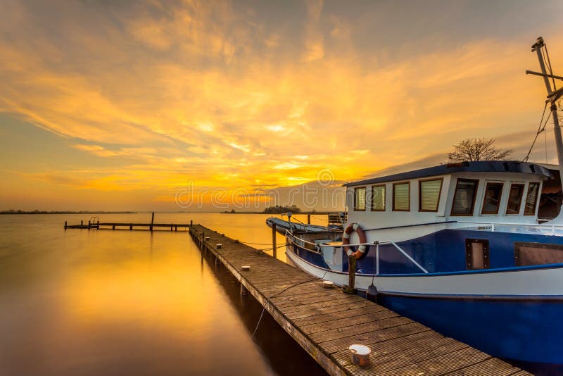 Boat on Jetty stock photo. Image of coast, boating, dock - 45350468