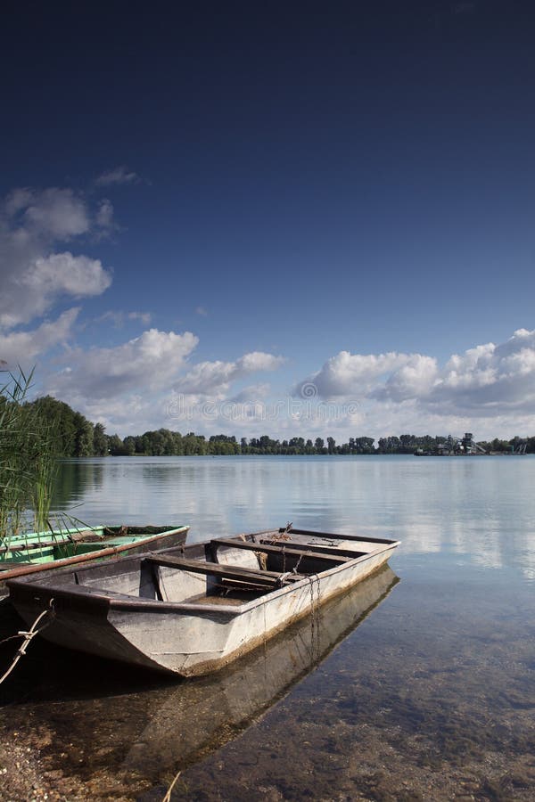 Row boat on Lake stock image. Image of atmosphere, outdoors - 12032631