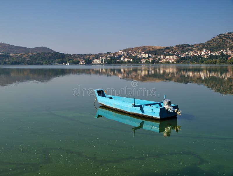 One Blue Boat on Still Lake Water Stock Photo - Image of color ...