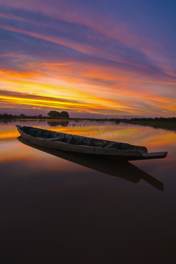 Boat at the Lake, Sunset Shot Stock Photo - Image of canoe, blue: 143486204