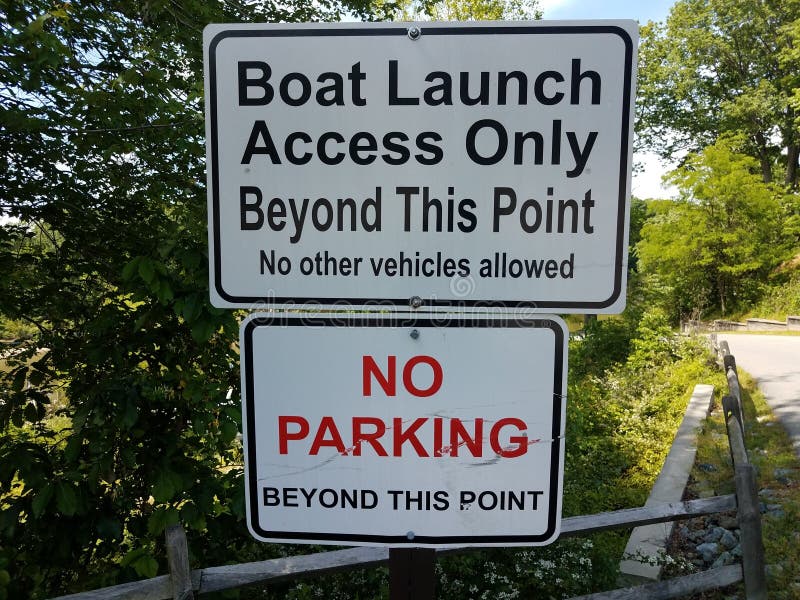 Boat Launch Access only Beyond this Point No Parking Sign Stock Photo ...