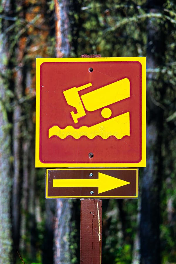 A Boat Launch Direction Sign with an Arrow Stock Photo - Image of lake ...