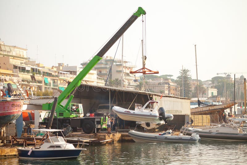 Boat lift for dry storage editorial stock photo. Image of commerce ...